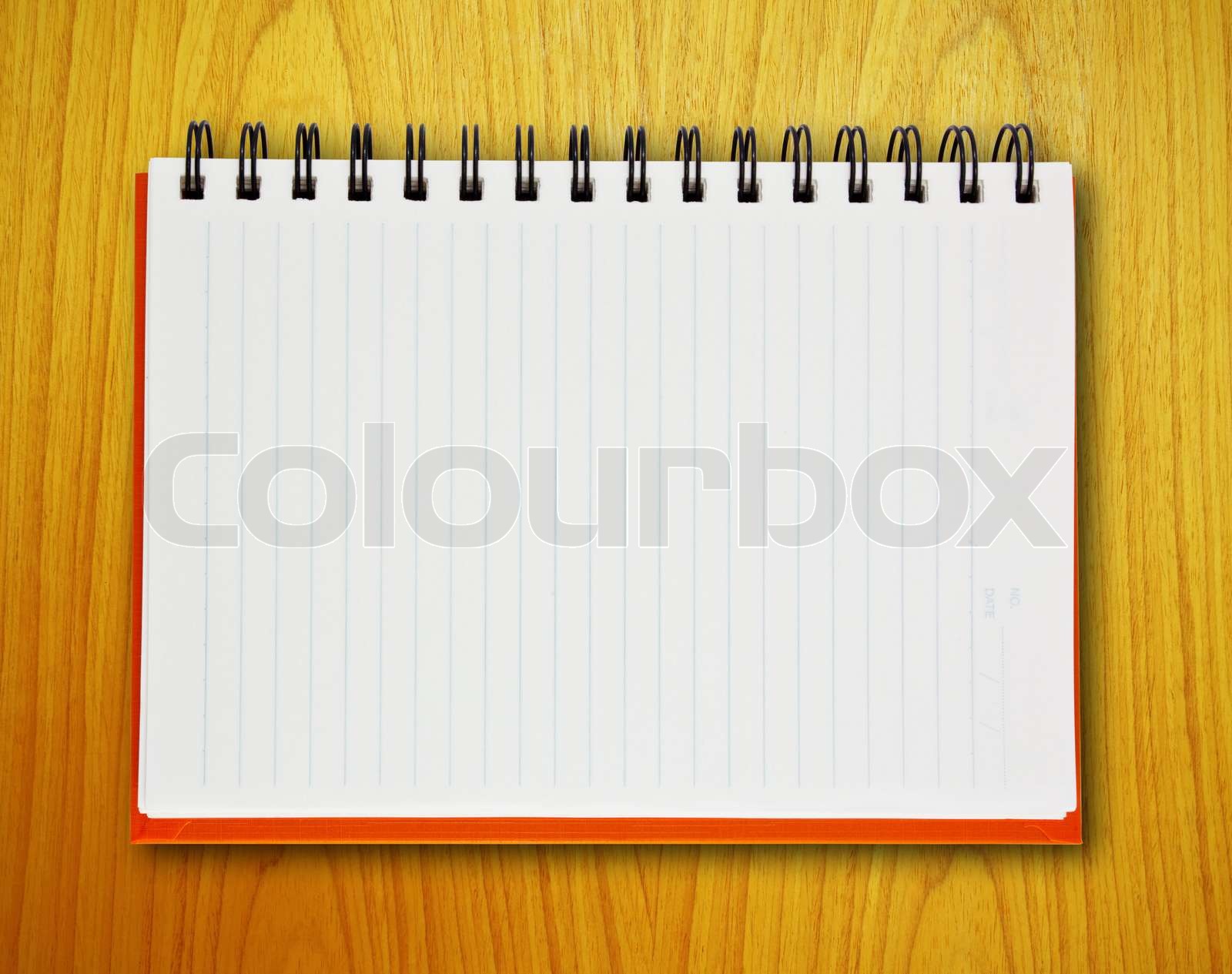 Open orange notebook | Stock image | Colourbox
