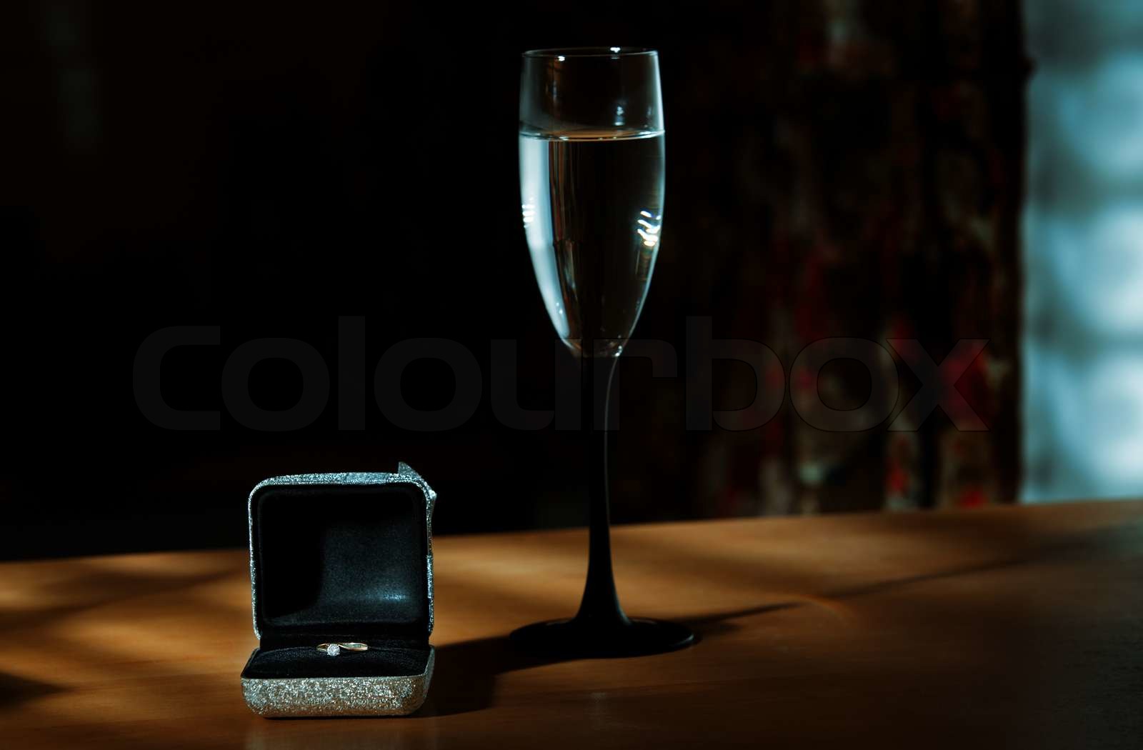 Wedding ring with wine | Stock image | Colourbox