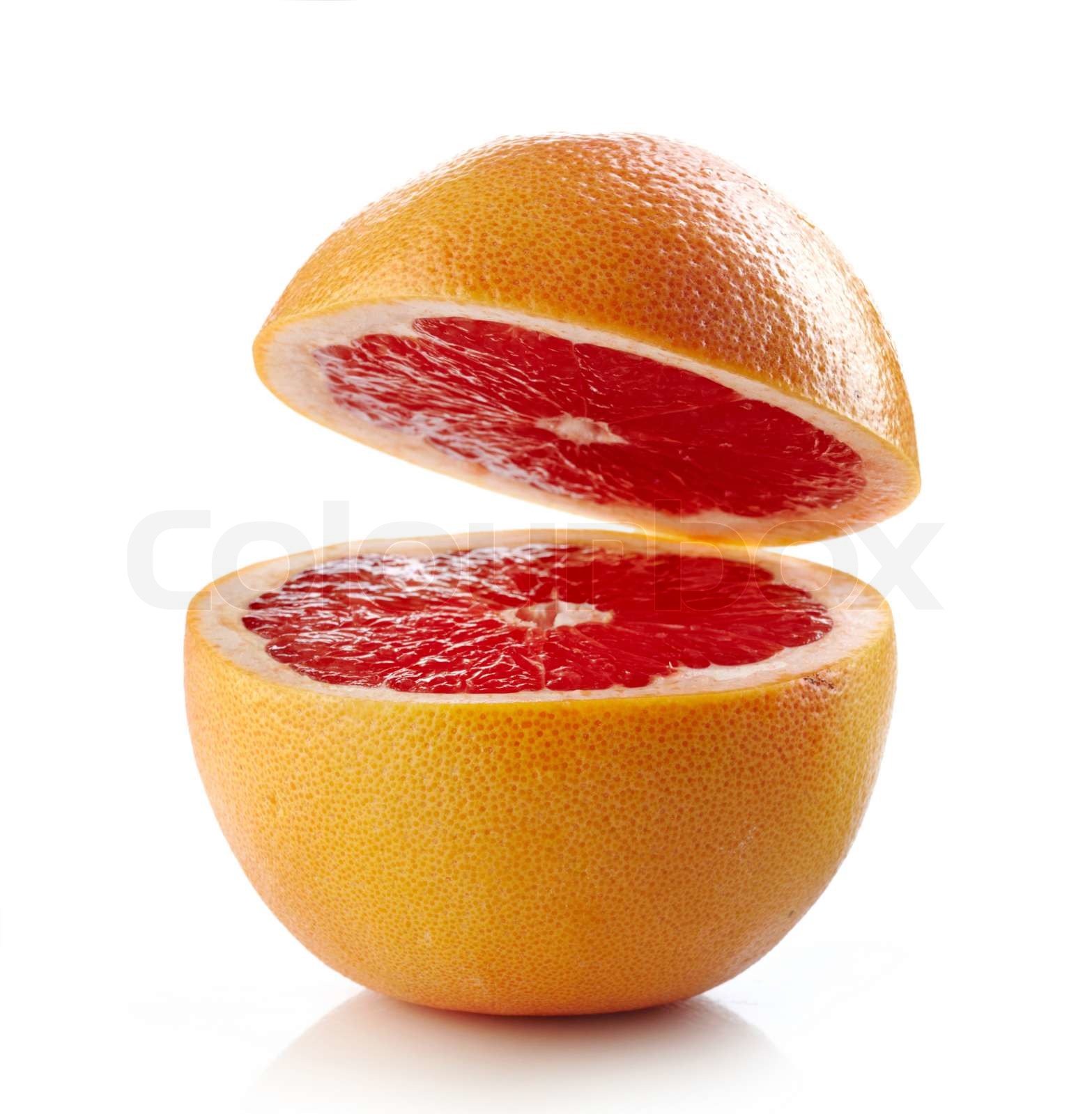 fresh half grapefruit | Stock image | Colourbox
