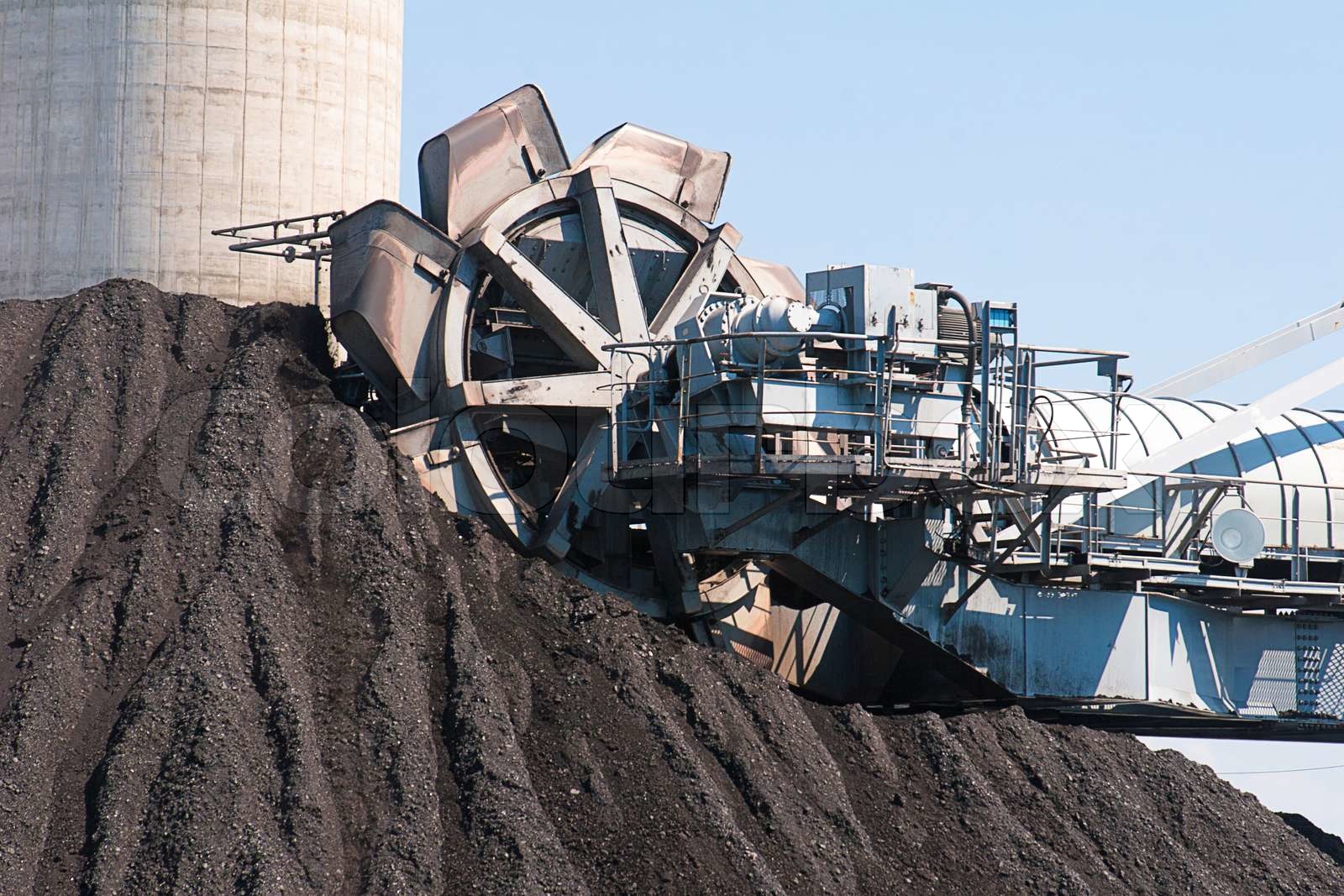 The machinedigging lignite to the tower plant to produce the ...