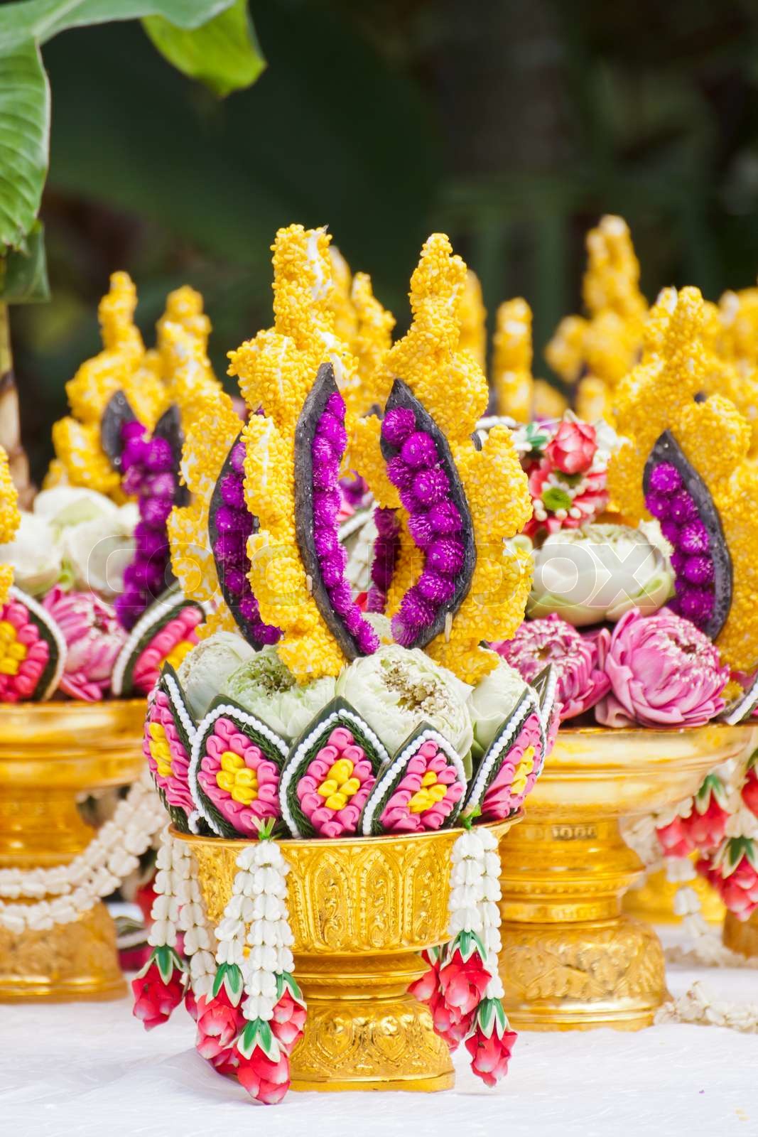 Thai flower decoretion on golden tray with pedestal use for blessed ...