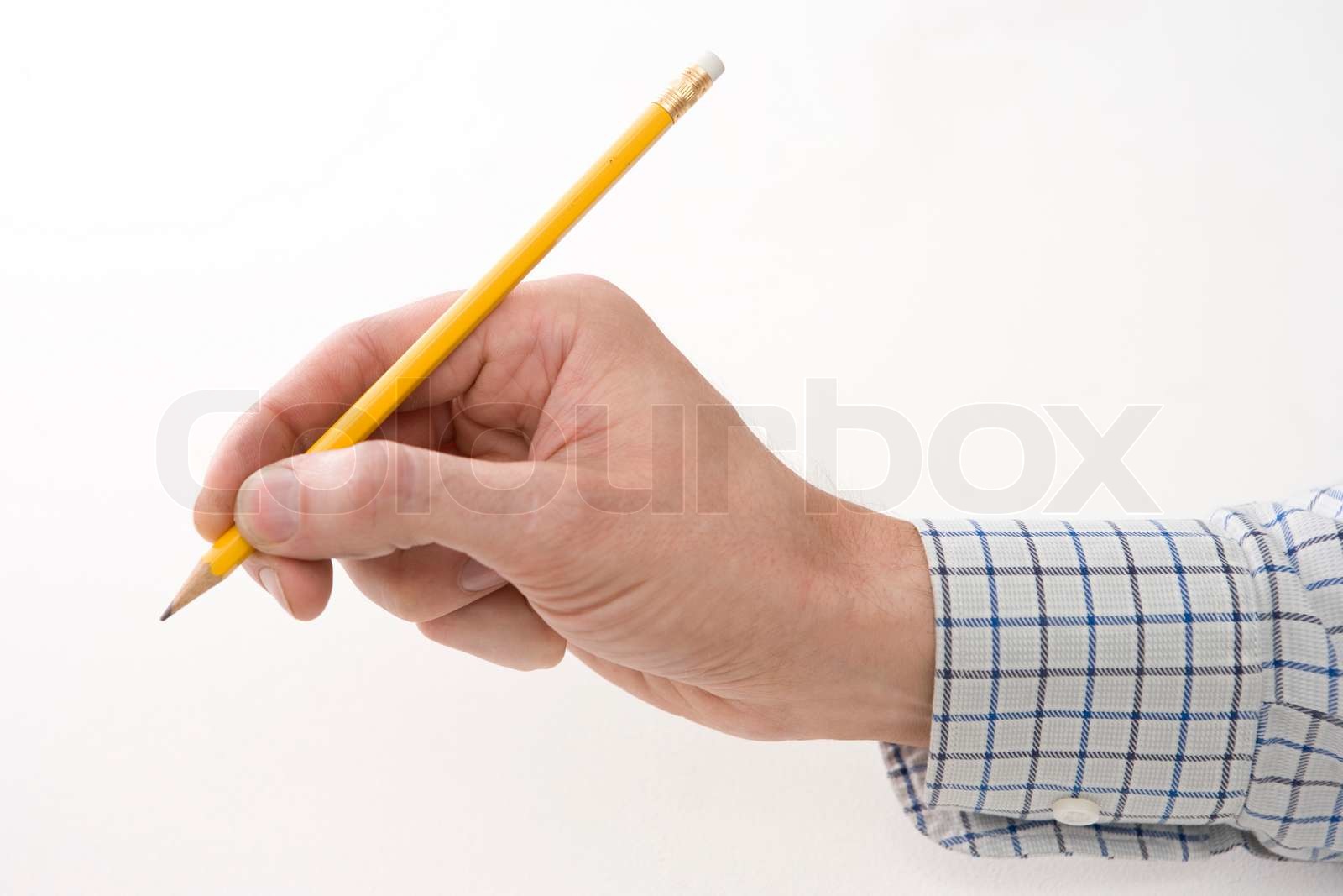 A man writing with a pencil | Stock image | Colourbox