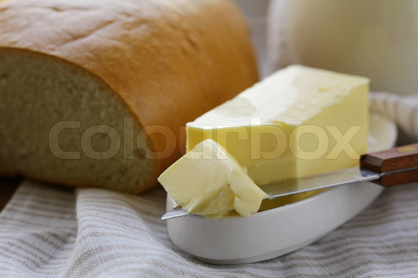 butter, loaf of white bread and milk | Stock image | Colourbox