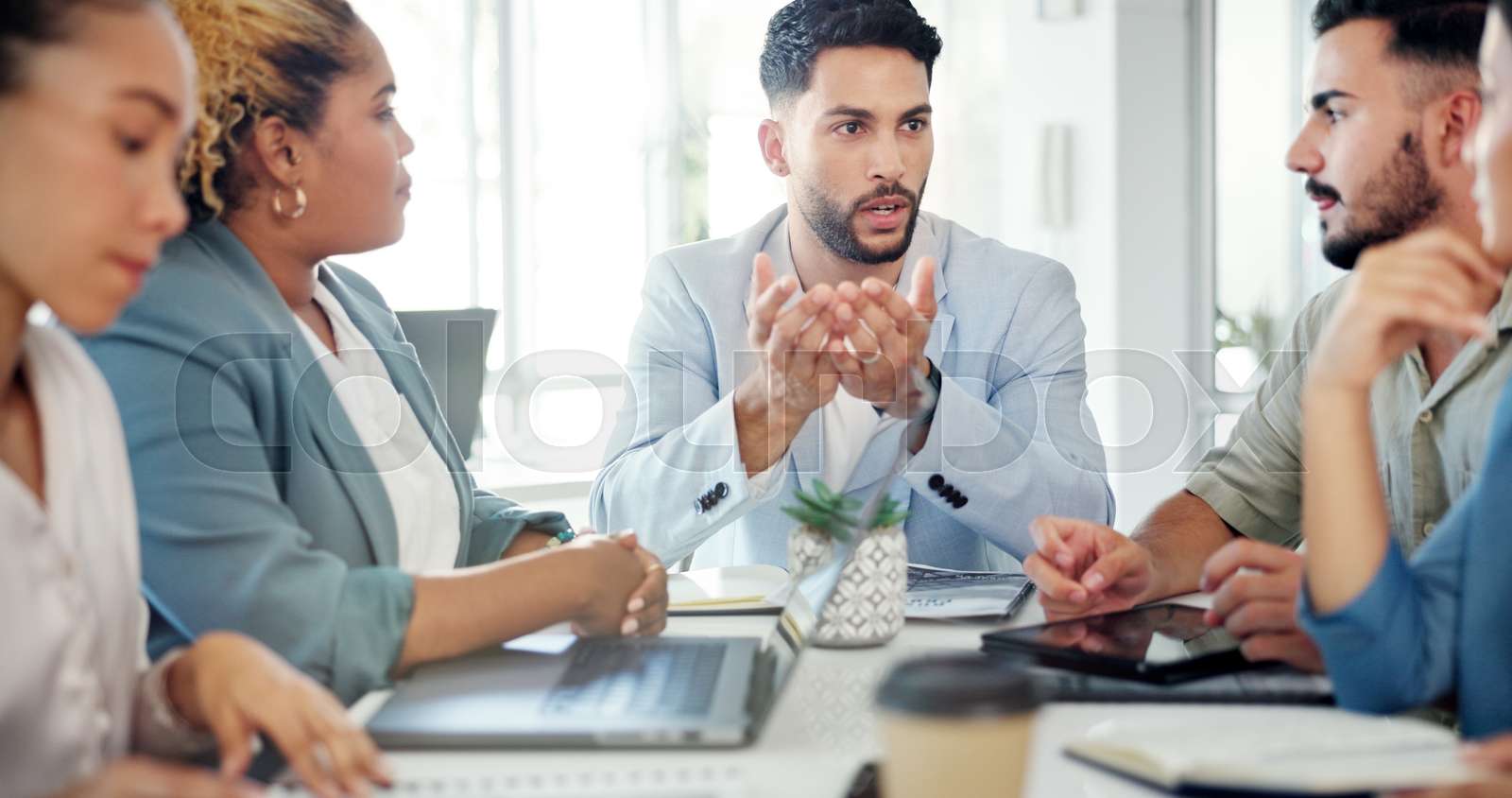 Business, man and leader with team, meeting and conversation for group ...