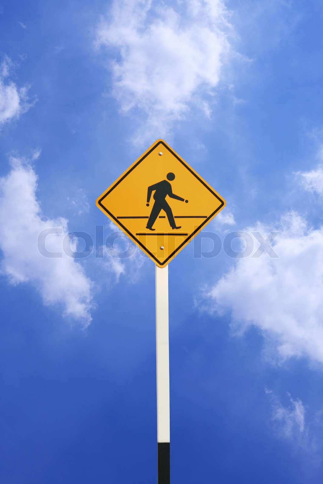 Yellow walk sign | Stock image | Colourbox