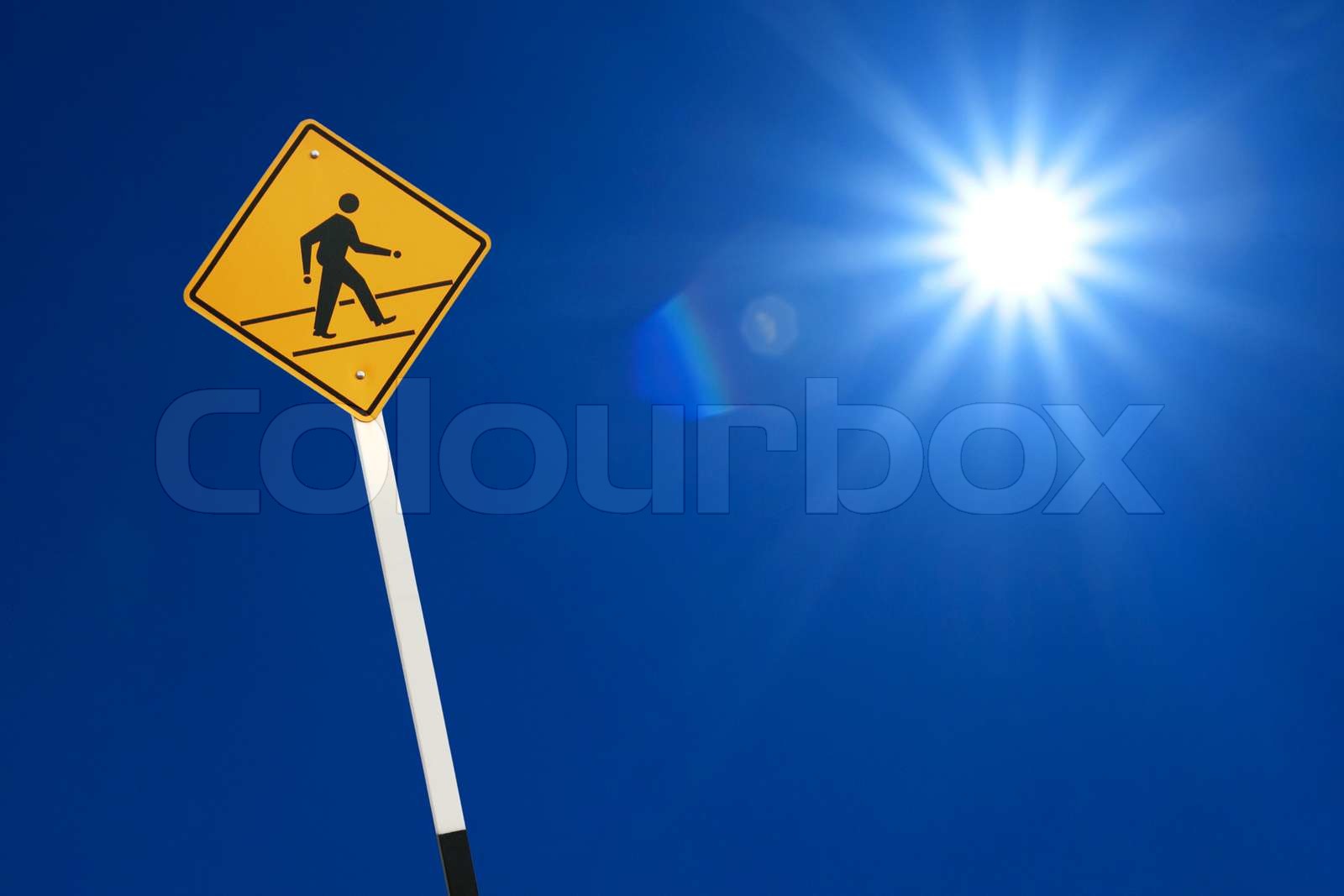 Yellow walk sign | Stock image | Colourbox