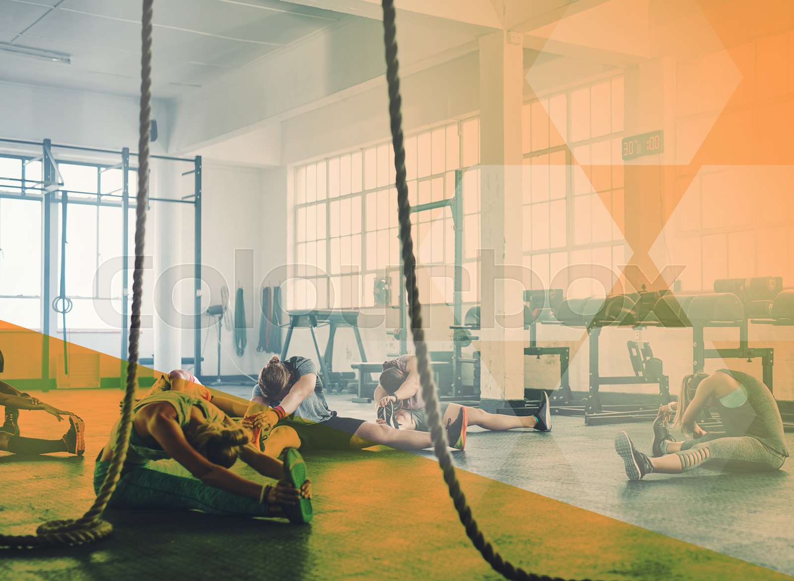 Fitness, stretching and a group of people at gym for exercise, workout ...