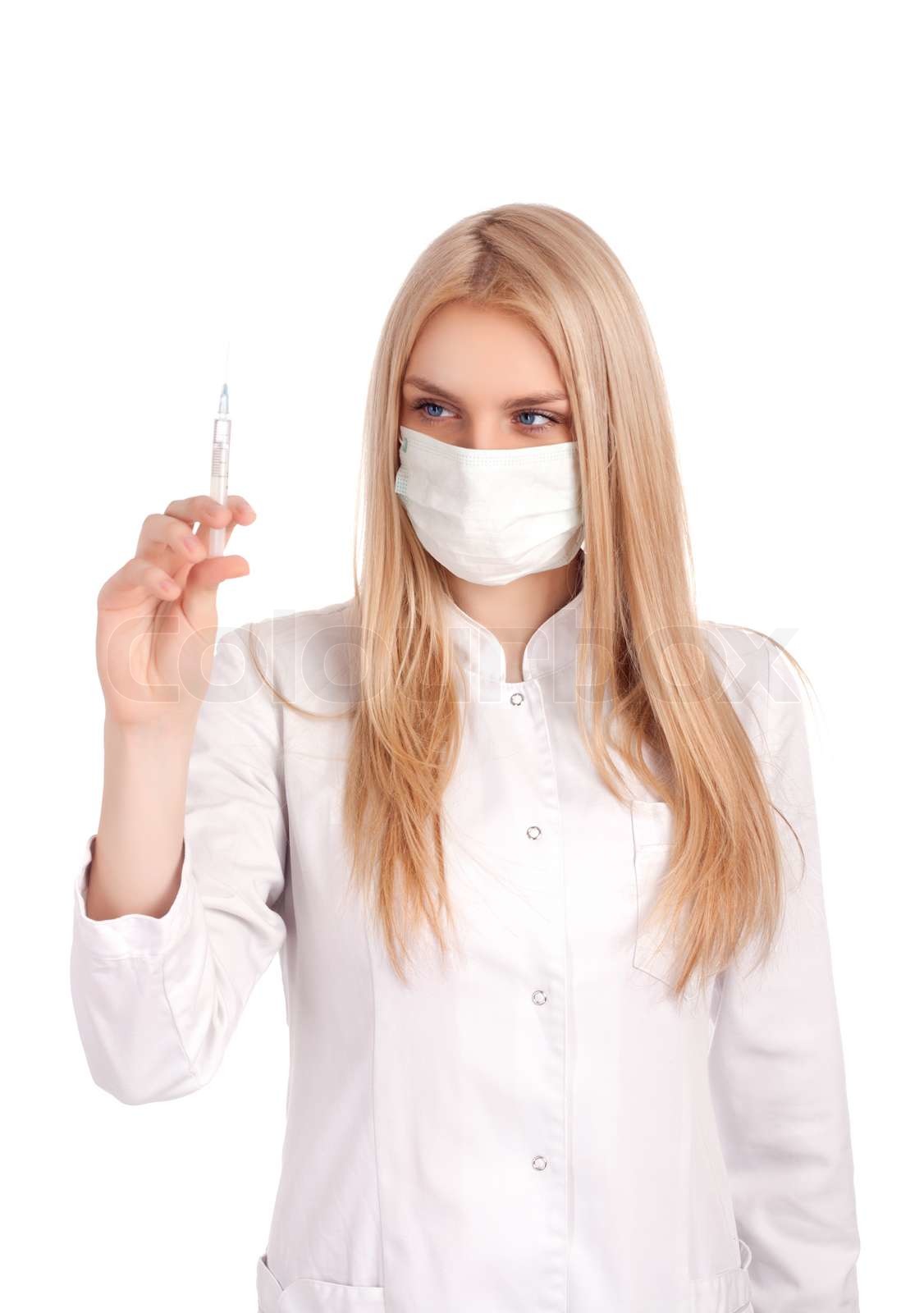 Læge med sprøjte | Stock foto | Colourbox