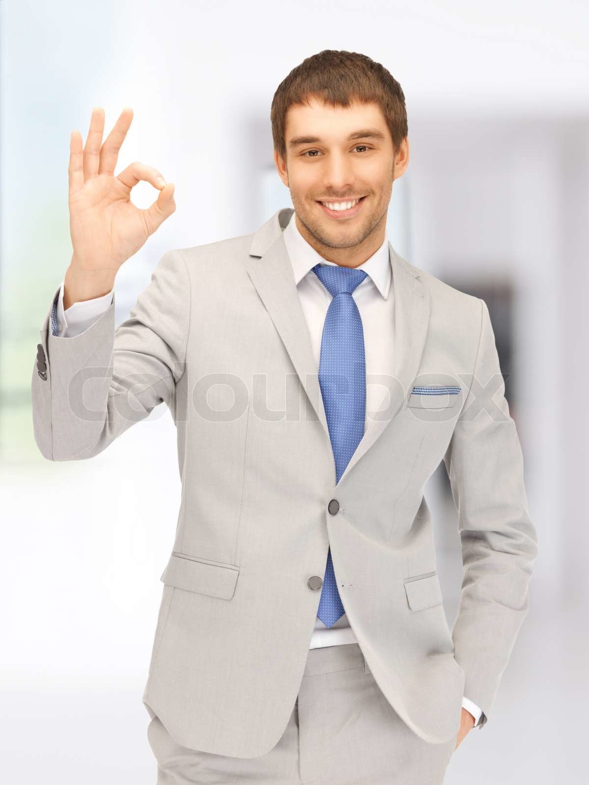 bright picture of handsome man showing ok sign | Stock image | Colourbox