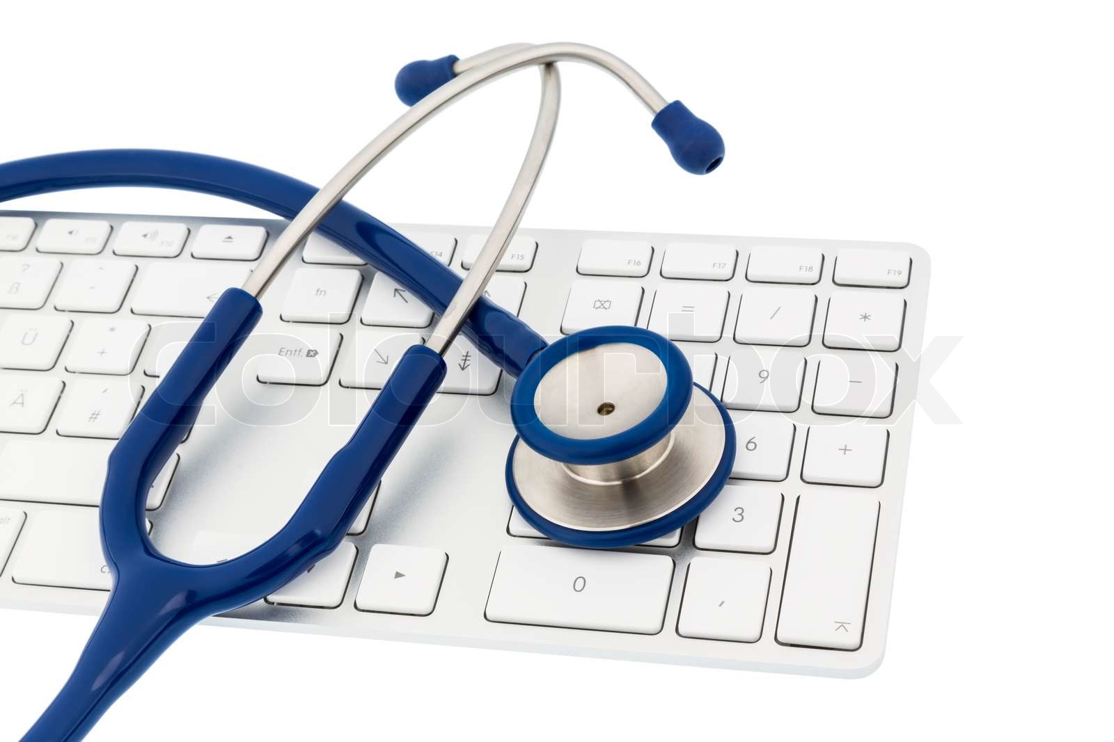 stethoscope and keyboard of a computer | Stock image | Colourbox