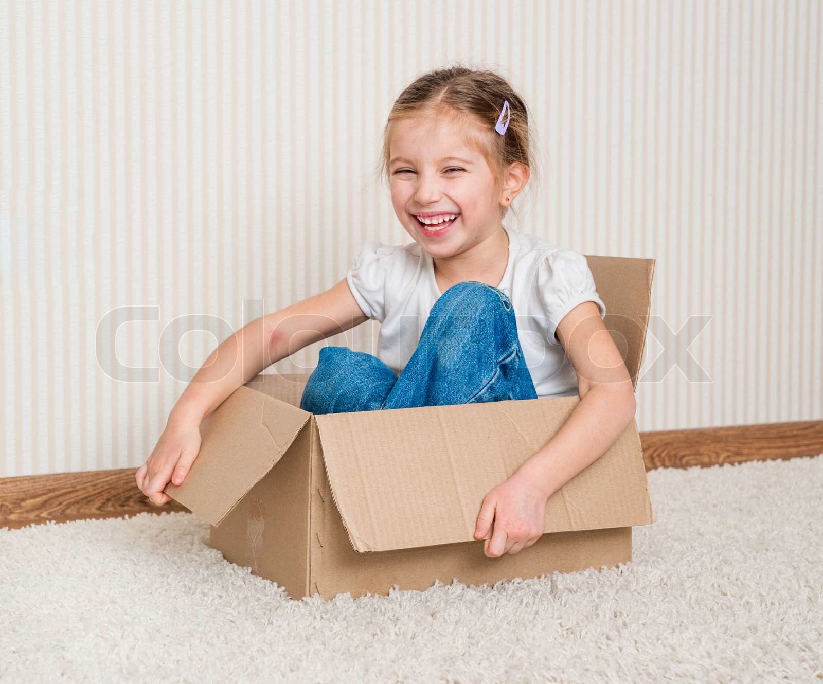 girl inside a box | Stock image | Colourbox