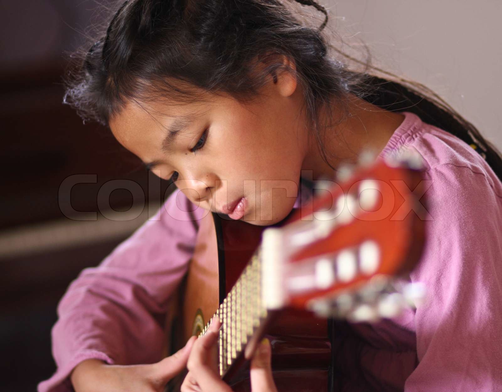 Playing guitar | Stock image | Colourbox