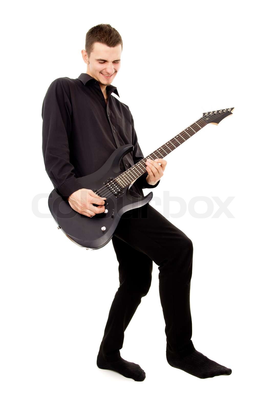 A Handsome Guy Plays The Electric Guitar Stock Image Colourbox