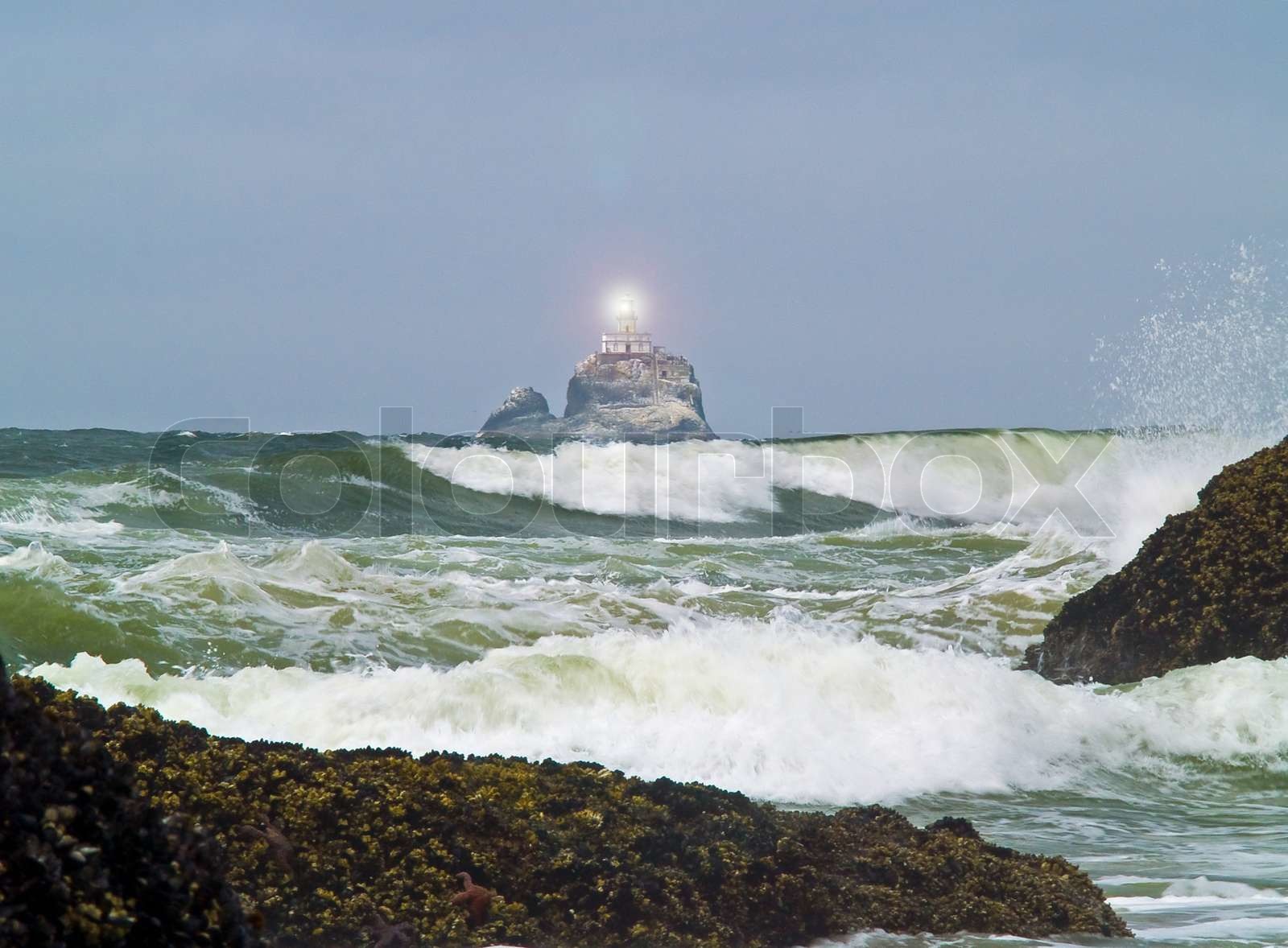 Terrible Tilly Lighthouse on Oregon Coast with Light Shining | Stock ...