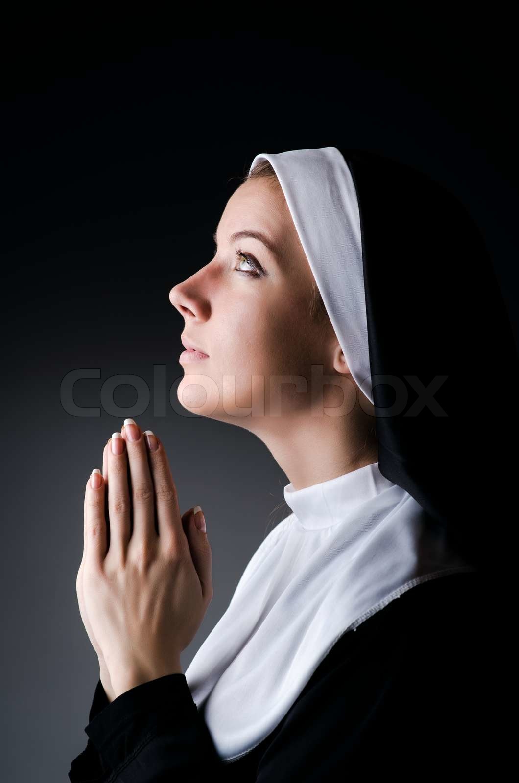 Junge Nonne in religiöses Konzept | Stock Bild | Colourbox