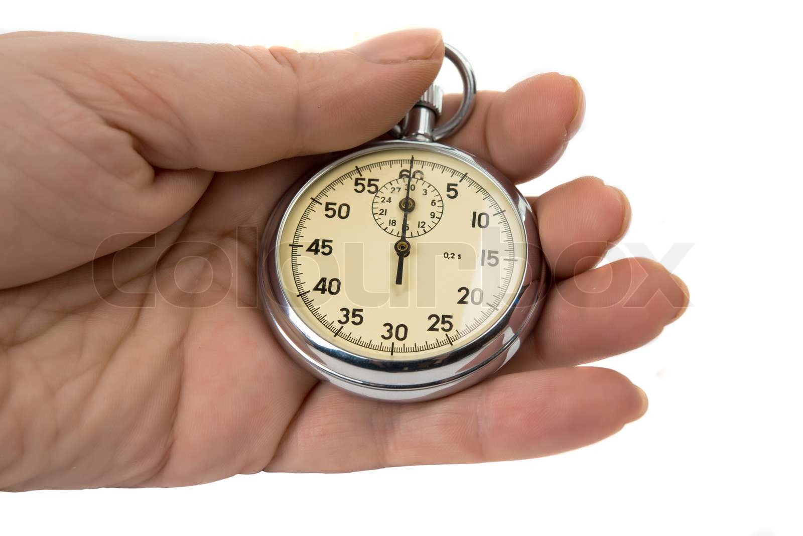 Stopwatch in hand isolated | Stock image | Colourbox