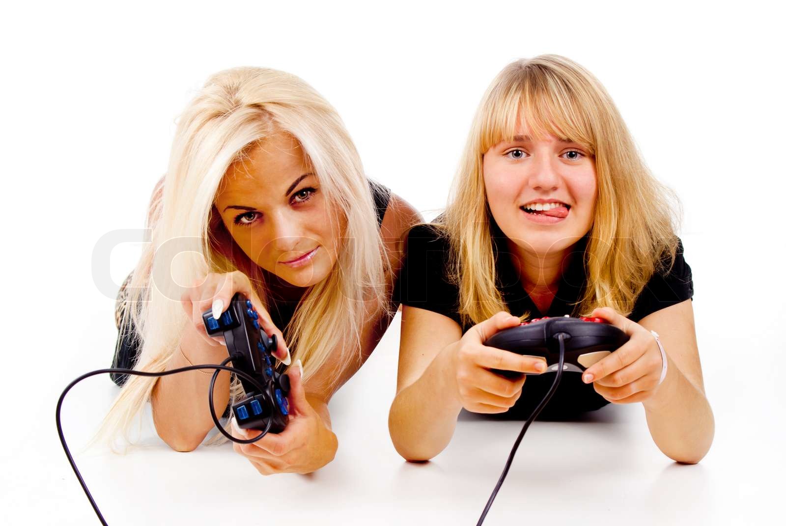 two happy girls play video games | Stock image | Colourbox