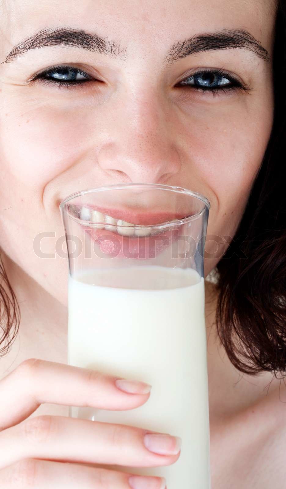 Young people eating milk | Stock image | Colourbox