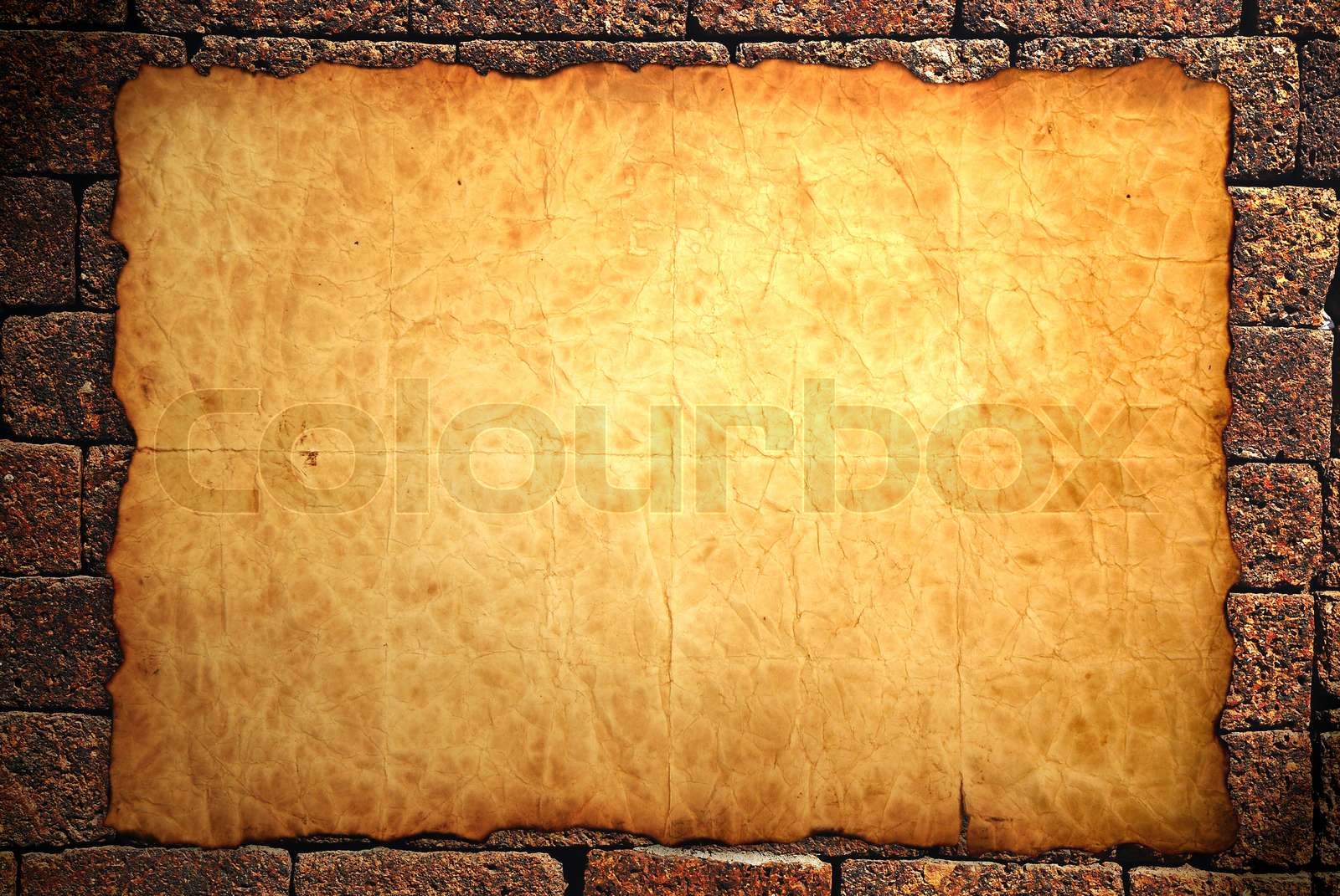 Old notebook paper on wall background | Stock image | Colourbox