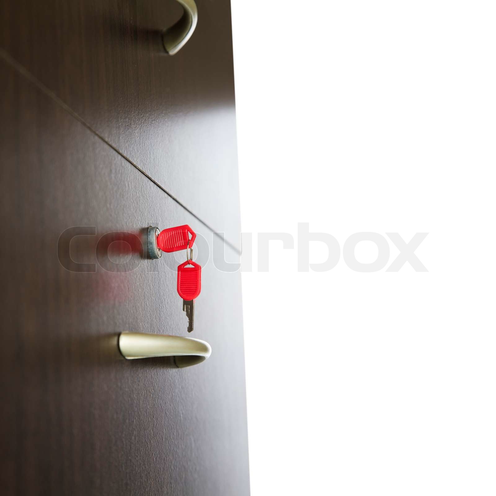 Close-up of a drawer with keys in lock | Stock image | Colourbox