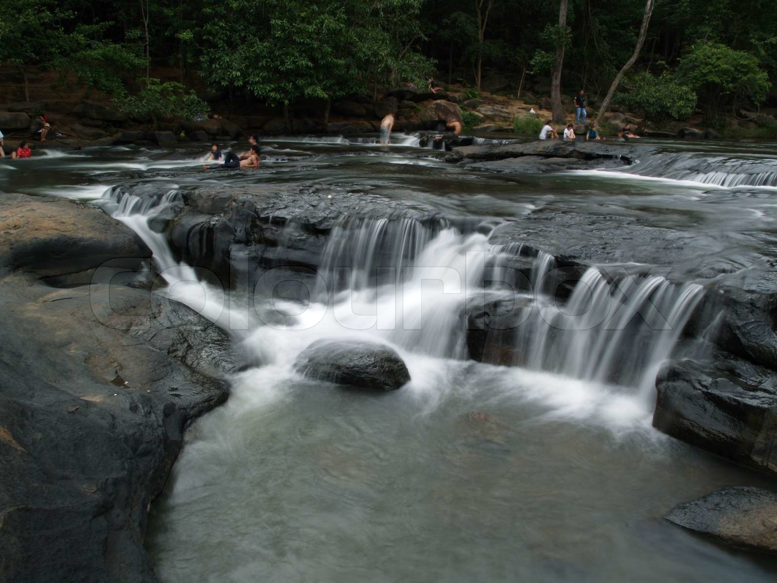 people at a waterfall in Thailand | Stock image | Colourbox
