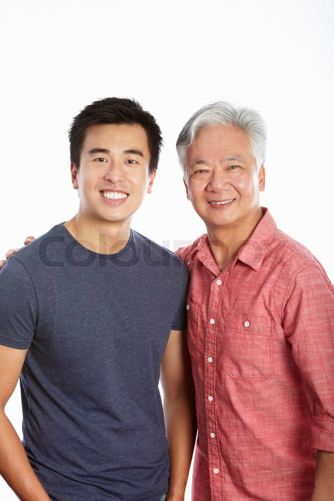 Studio Portrait Of Chinese Father With Adult Son | Stock image | Colourbox