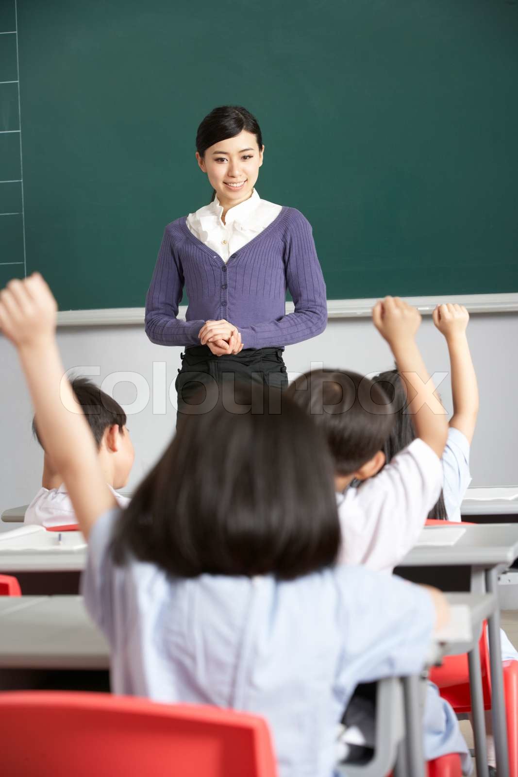 Teacher With Students In Chinese School Classroom | Stock image | Colourbox