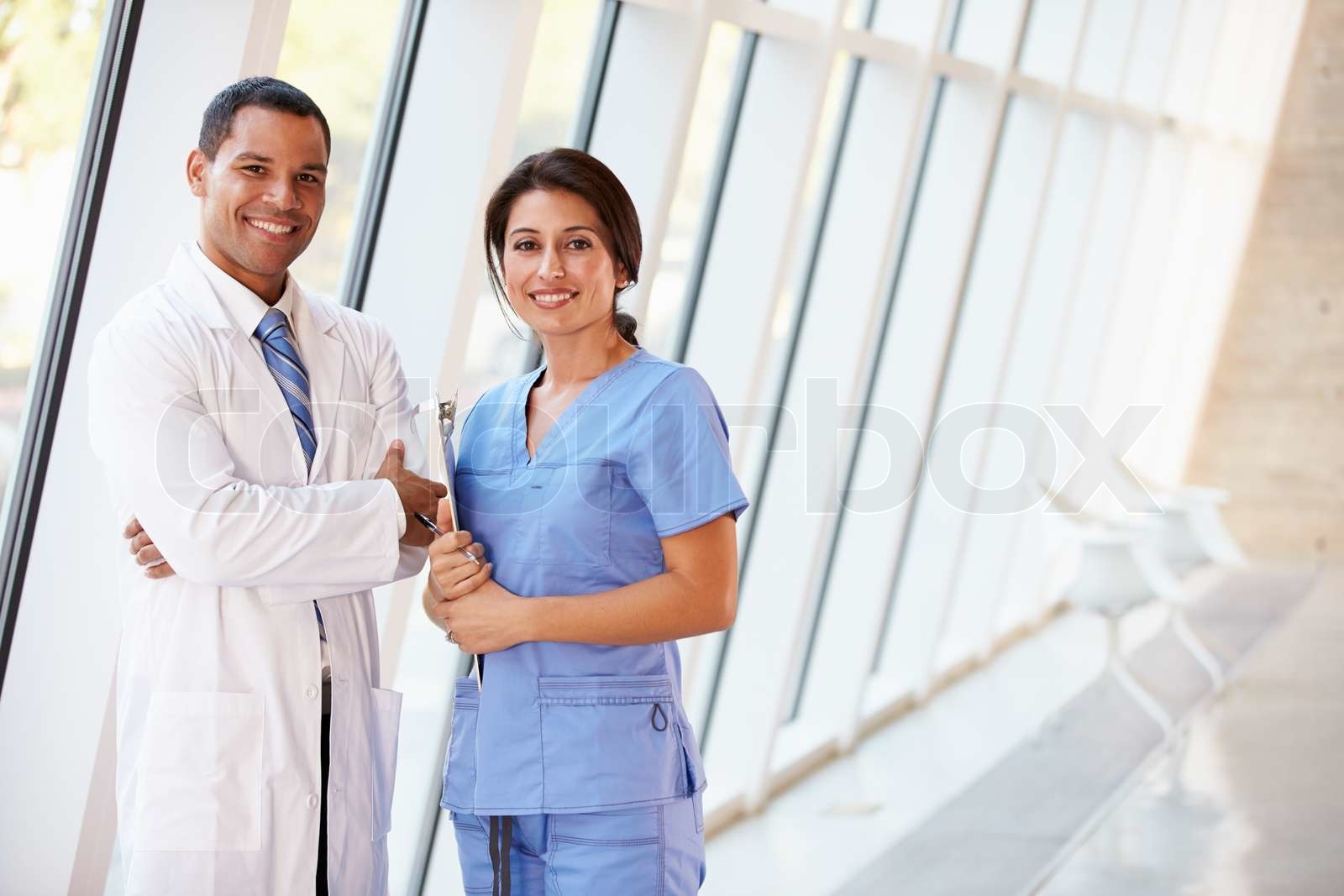 Portrait Of Medical Staff In Corridor Of Modern Hospital | Stock image ...