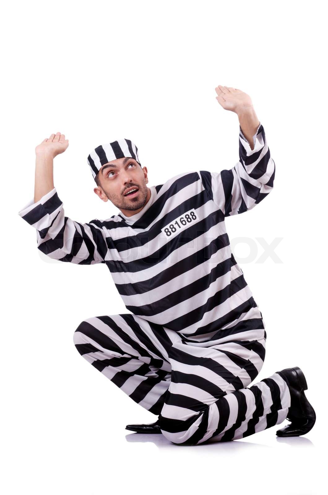 Convict criminal in striped uniform | Stock image | Colourbox