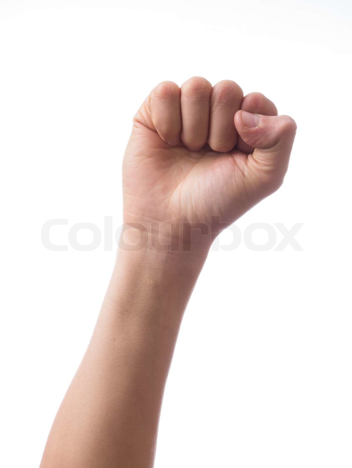 A hand clutched in his fist | Stock image | Colourbox