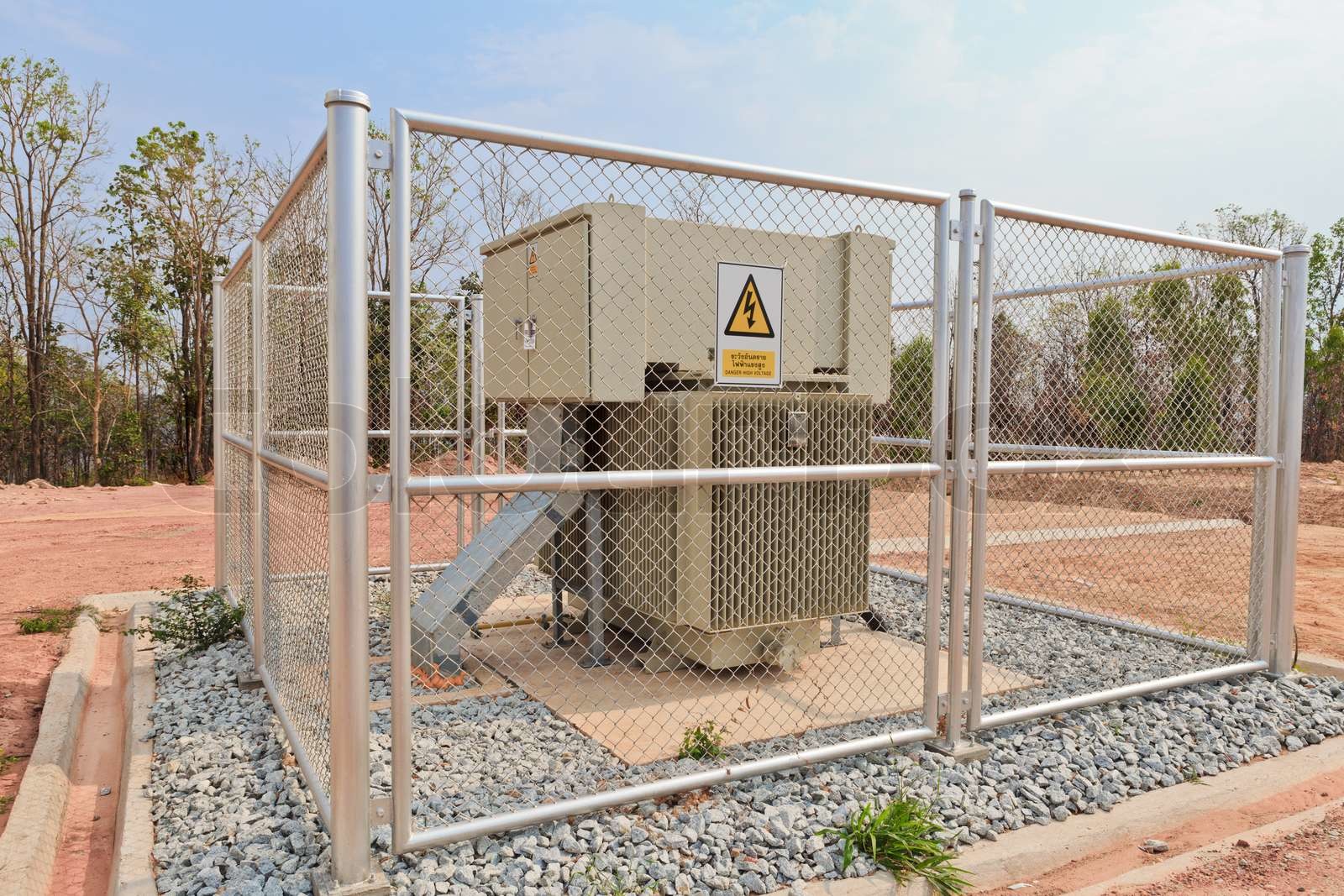 high-voltage substation in a metal fence | Stock image | Colourbox