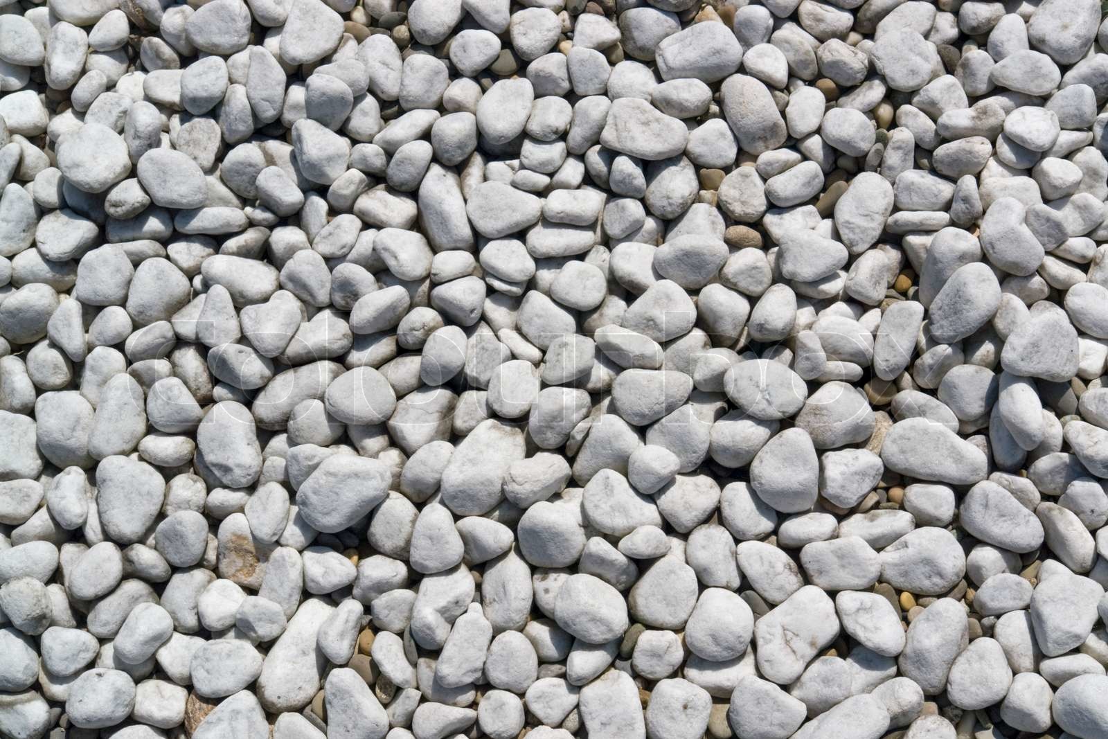 kleinen Kieselsteinen Hintergrund | Stock Bild | Colourbox