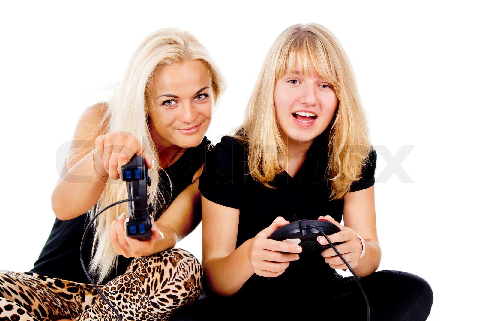 two girls play video games | Stock image | Colourbox