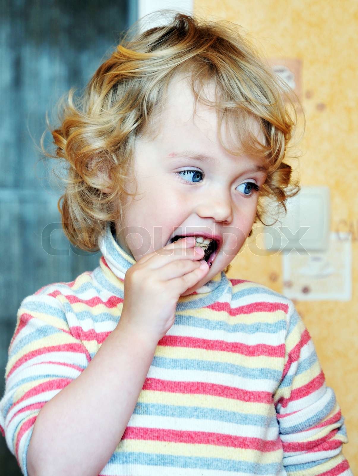 girl eating sweets | Stock image | Colourbox