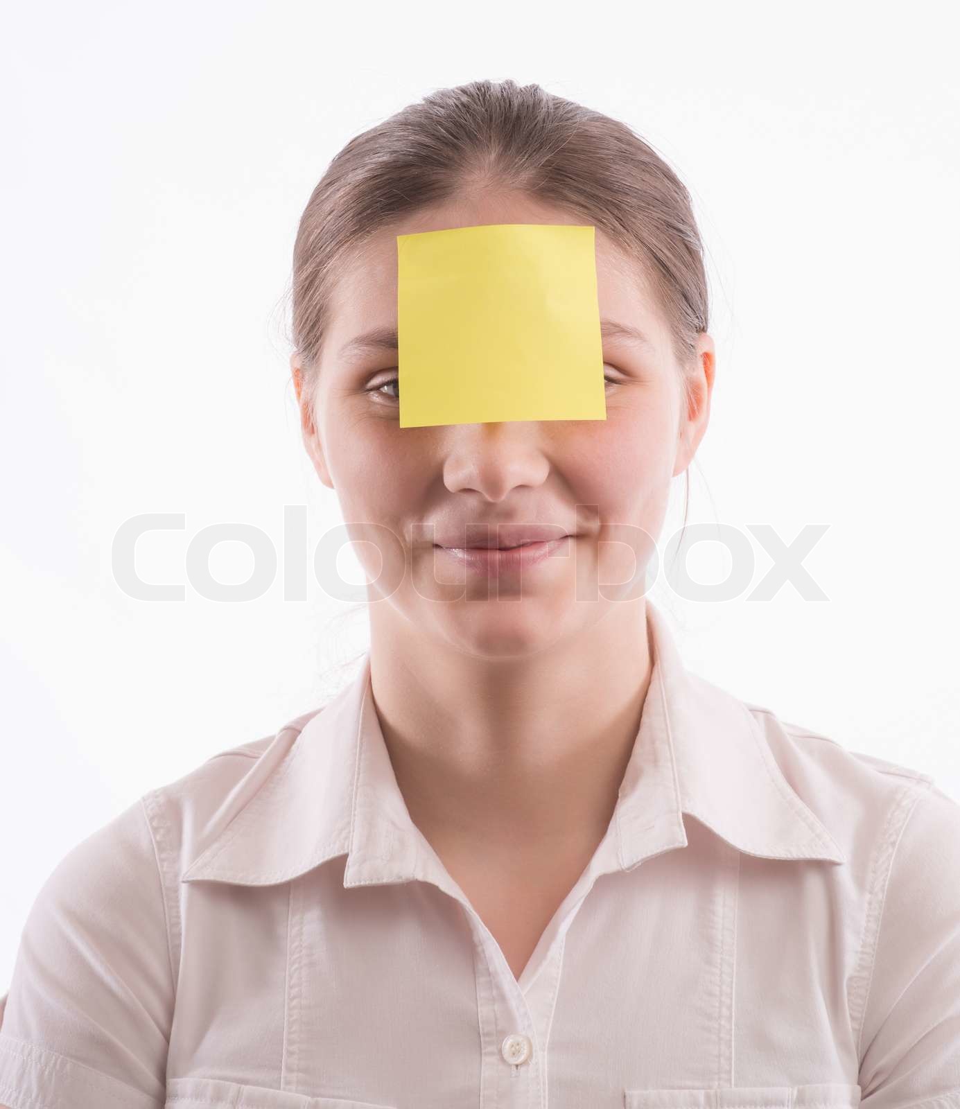 piece of paper on her forehead | Stock image | Colourbox