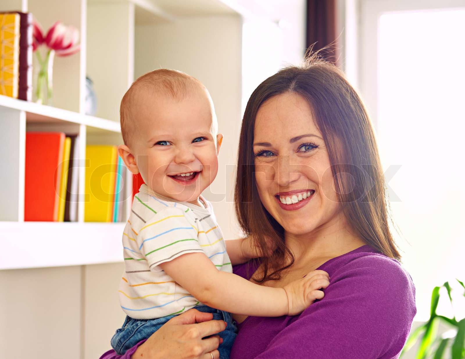 mother with laughing son looking at camera | Stock image | Colourbox
