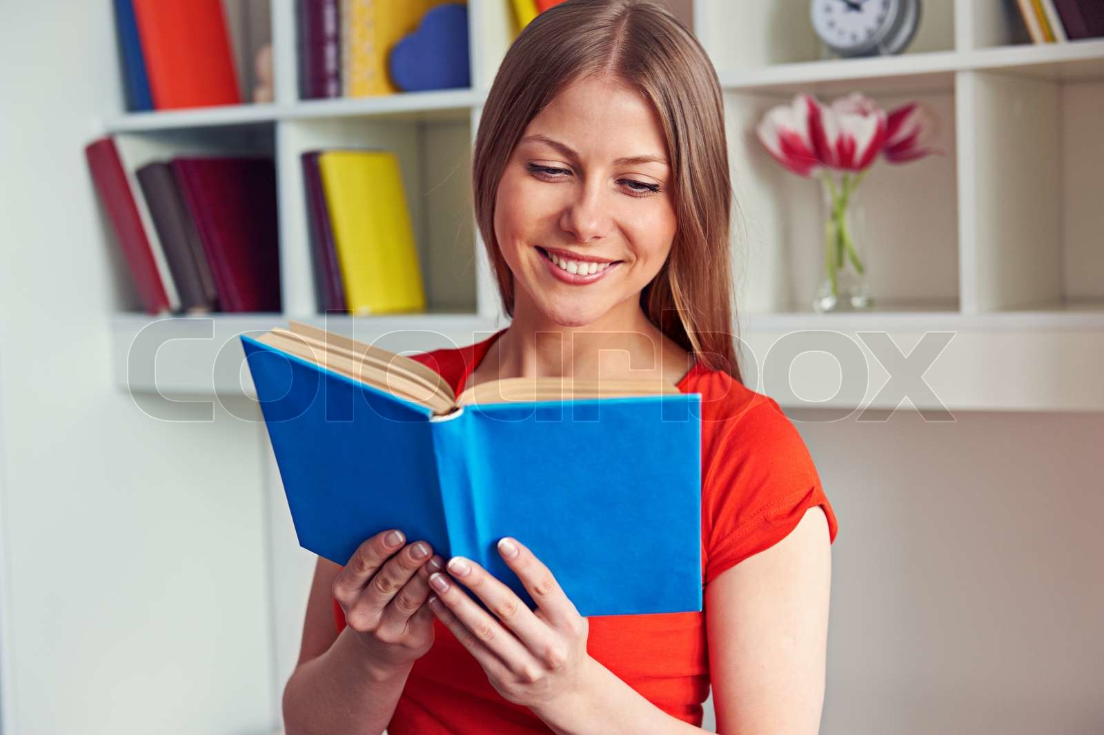 pretty woman reading the book | Stock image | Colourbox