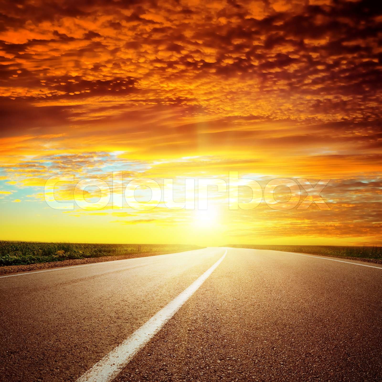 red dramatic sunset over asphalt road | Stock image | Colourbox