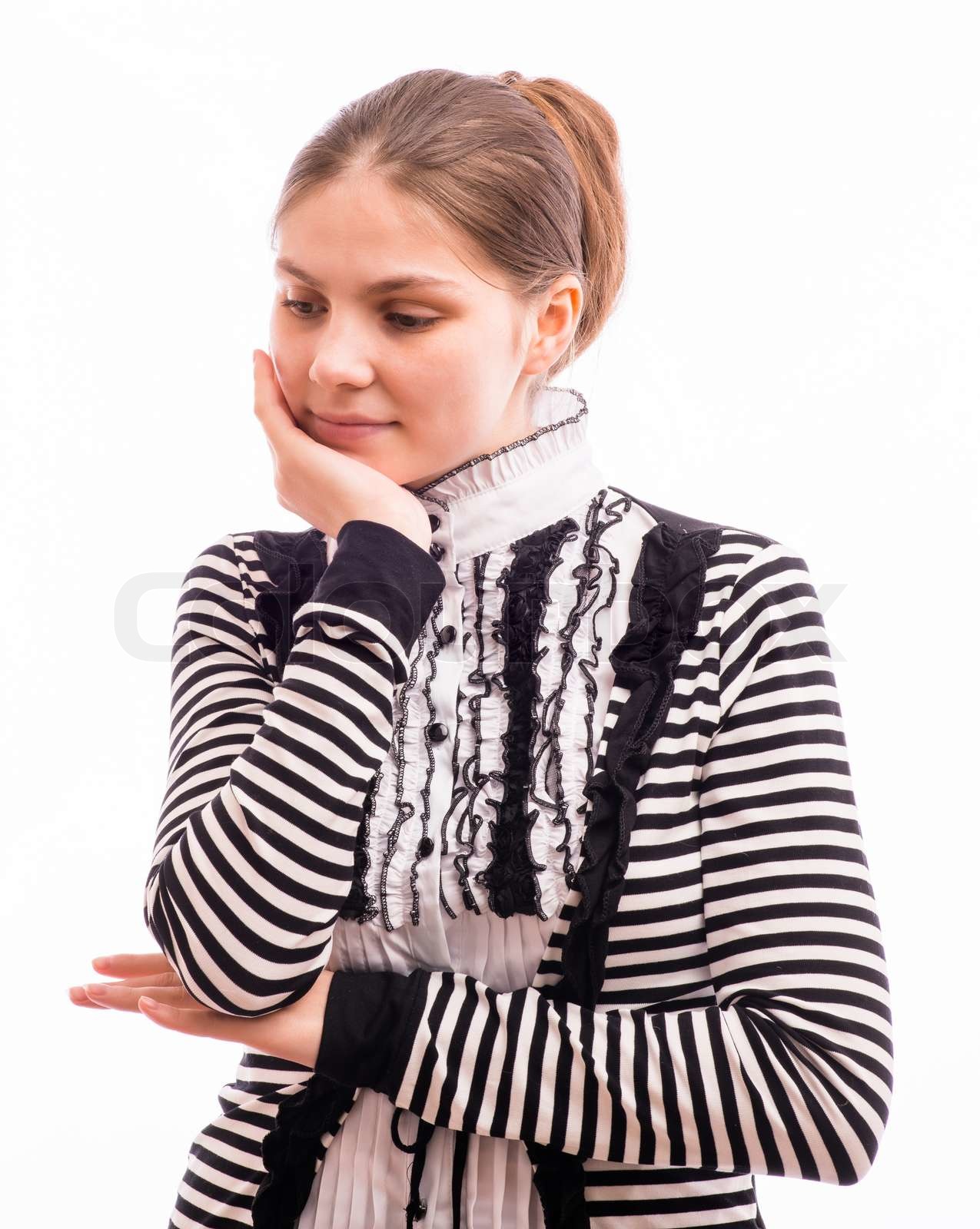 Woman Peaking Through Hands on her face | Stock image | Colourbox