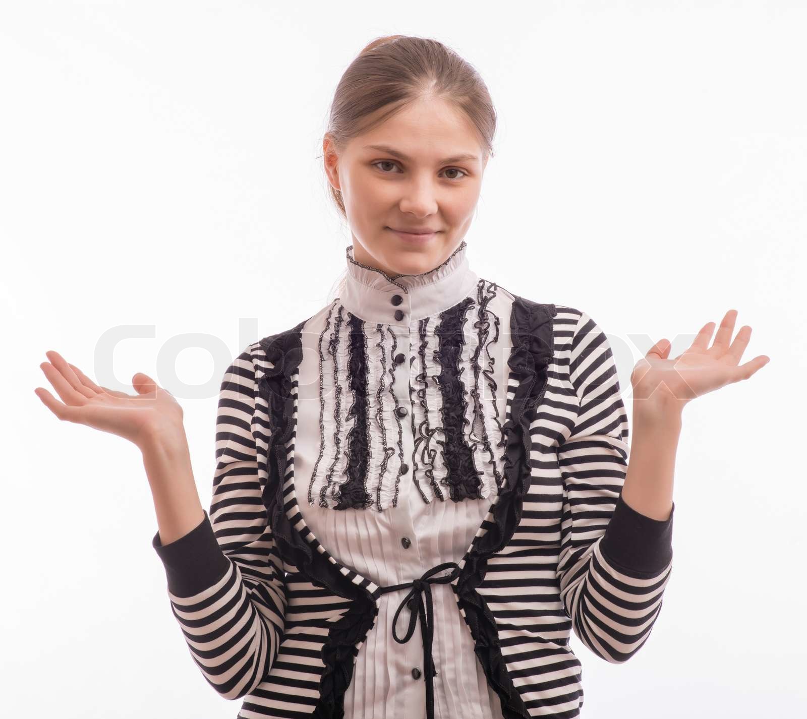 Young woman shrugs | Stock image | Colourbox