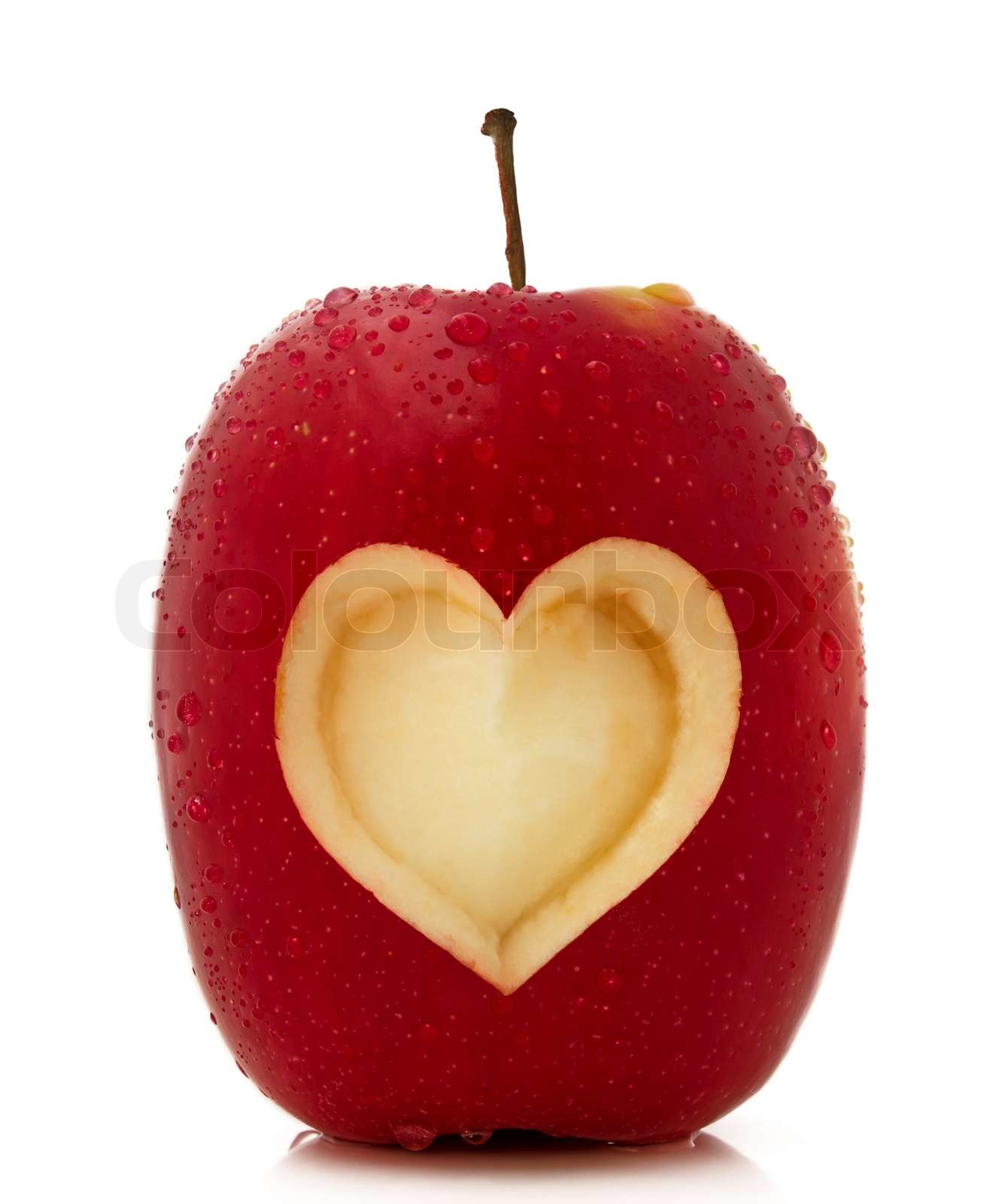 Apple with heart shape | Stock image | Colourbox