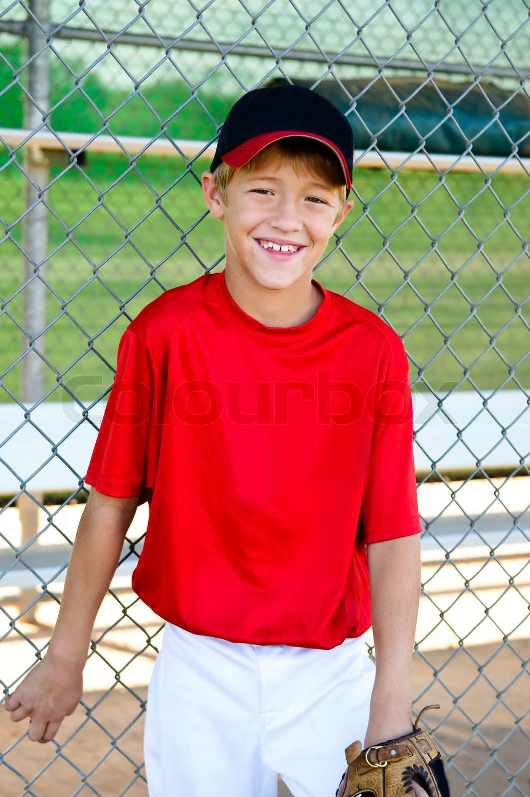 Youth baseball player portrait | Stock image | Colourbox