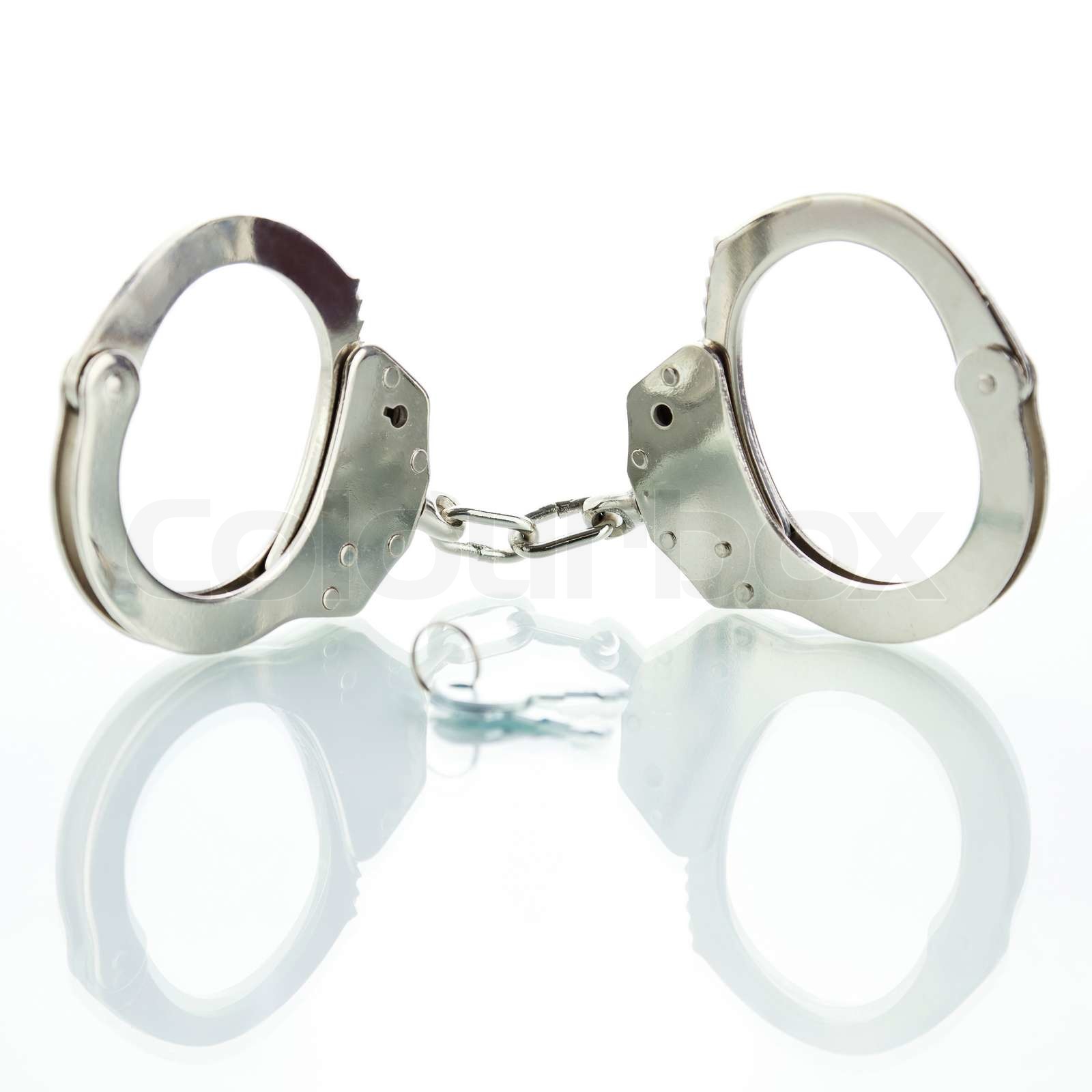 Handcuffs with shadow | Stock image | Colourbox