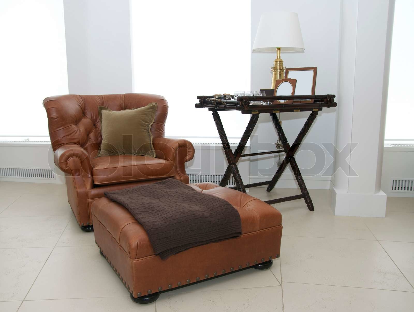 chair and a small table for books | Stock image | Colourbox