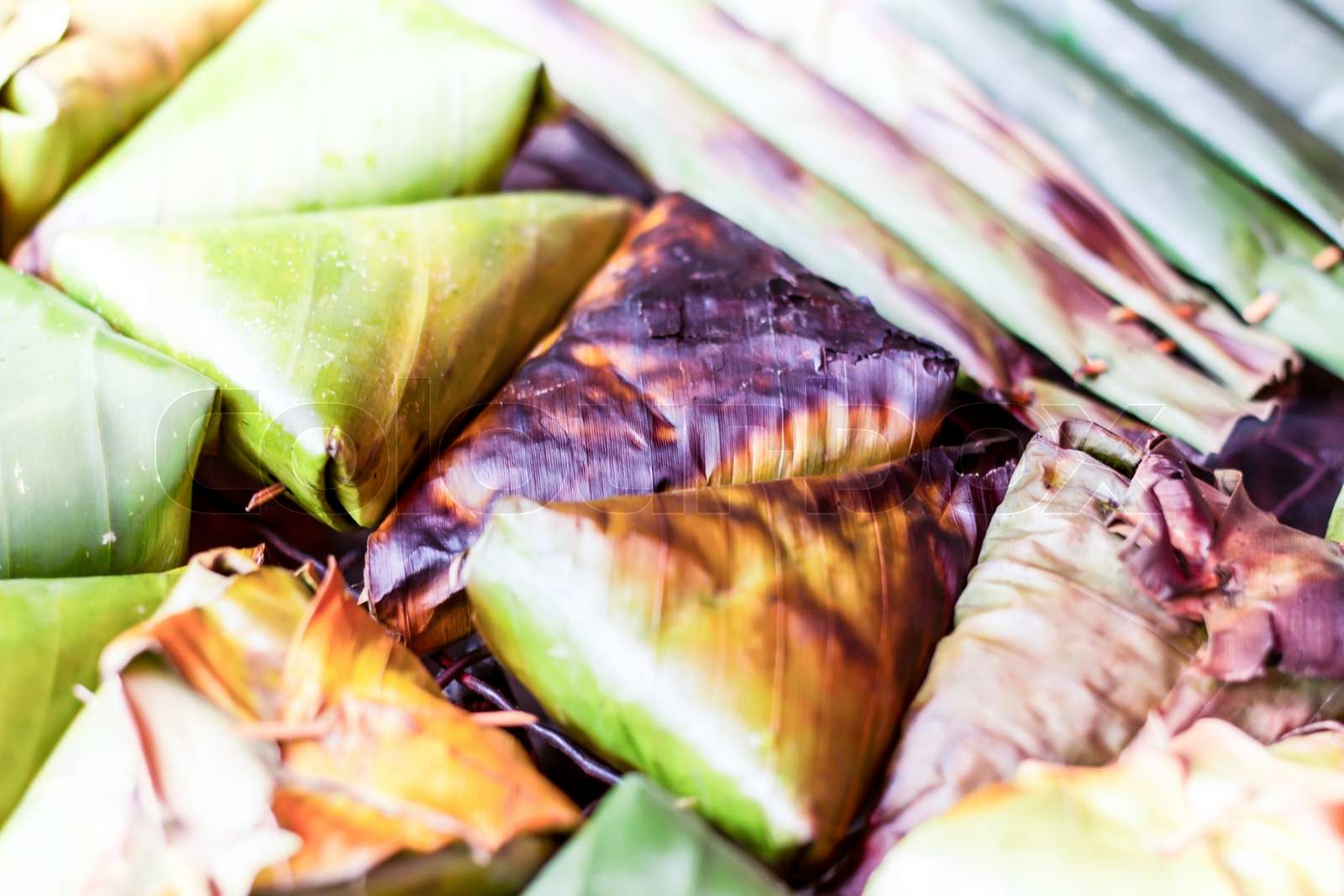 Sticky Rice wrapped in banana leaf grilled | Stock image | Colourbox