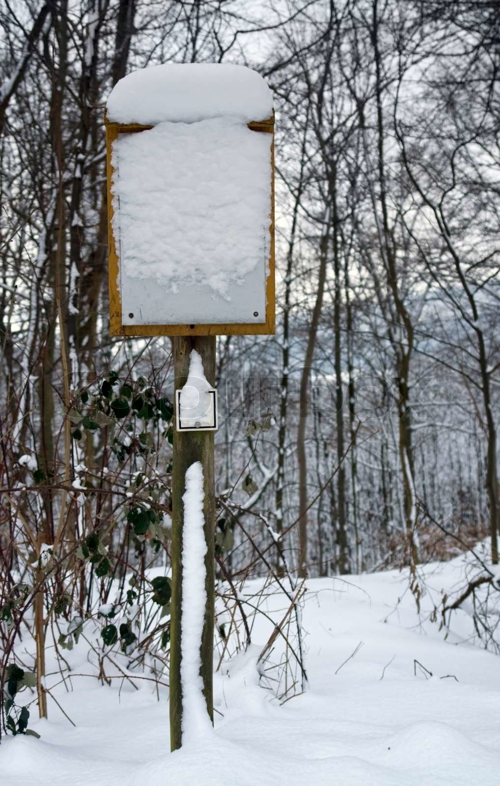 snow covered sign | Stock image | Colourbox