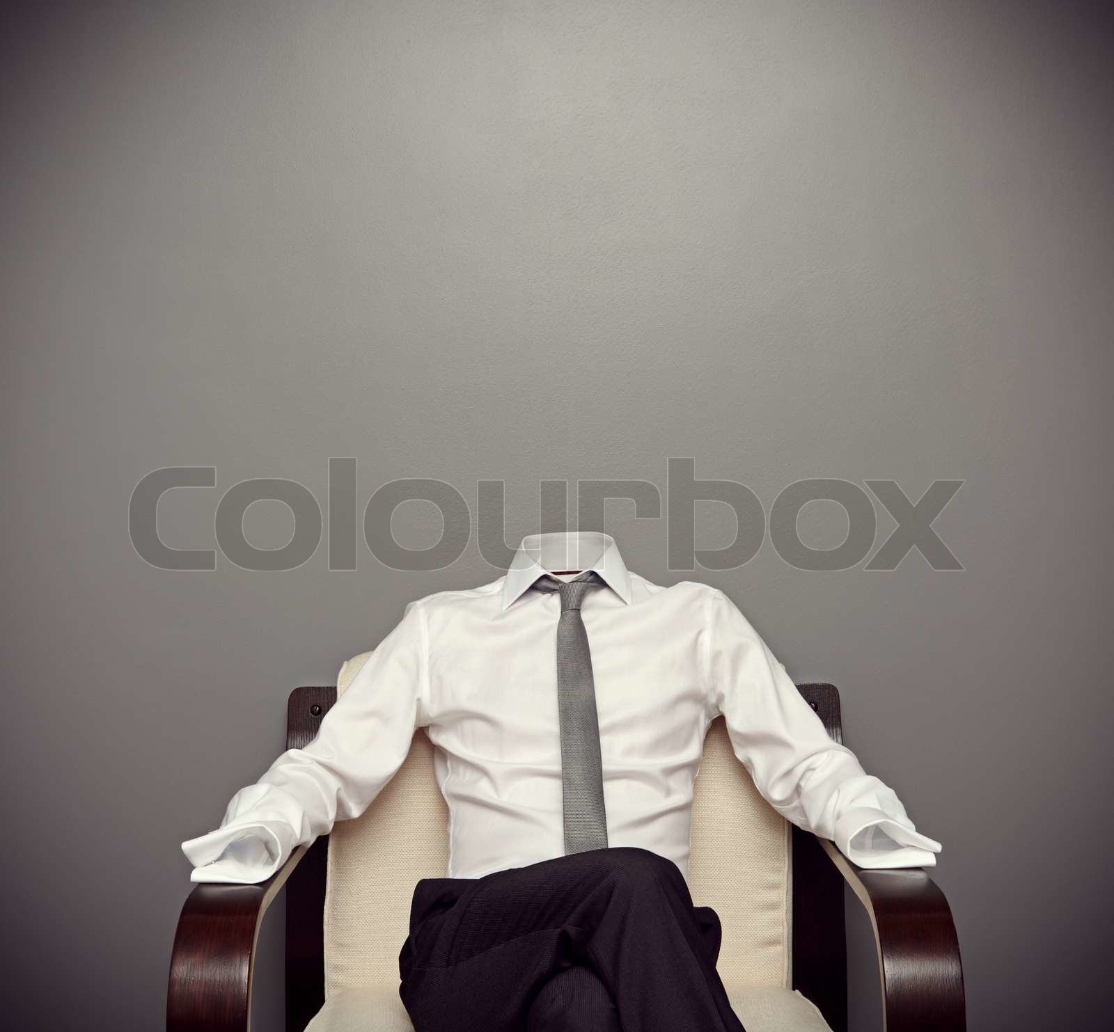 invisible man sitting on armchair | Stock image | Colourbox