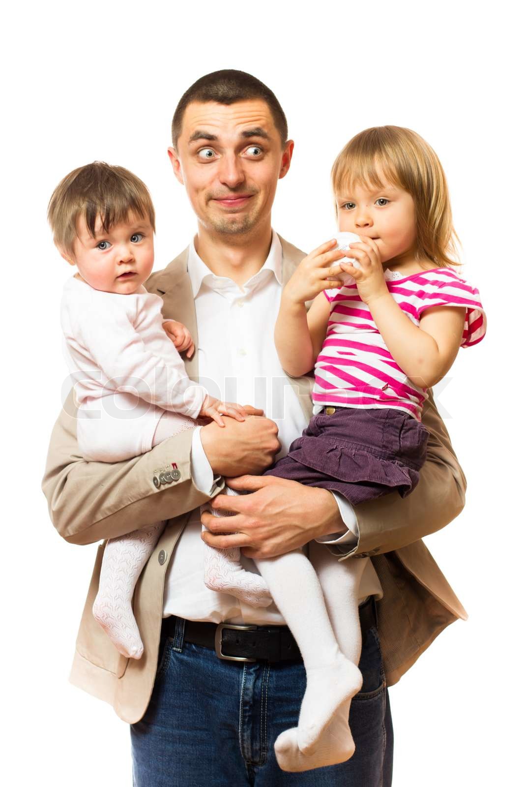 father holds two daughters | Stock image | Colourbox