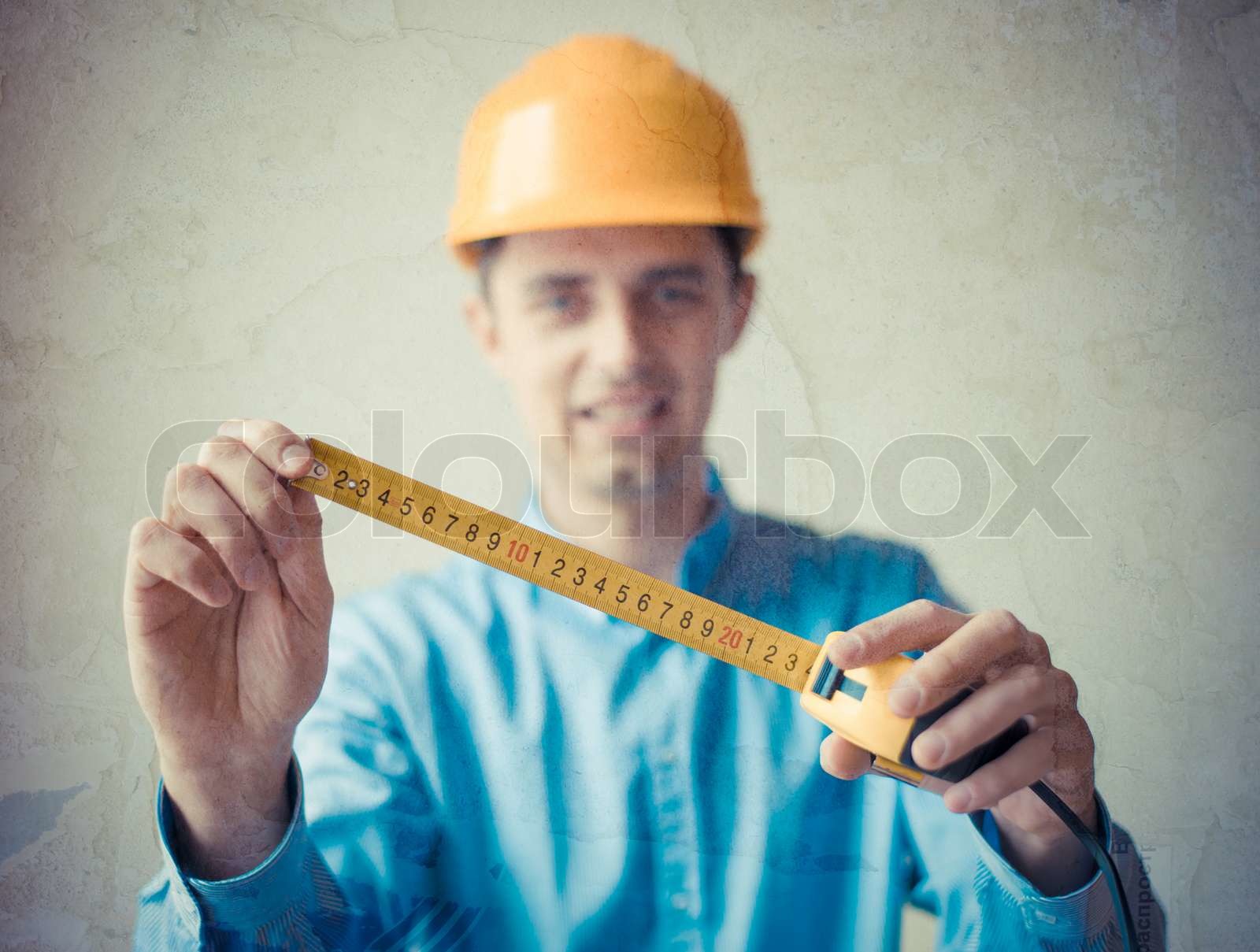 Architect measuring | Stock image | Colourbox
