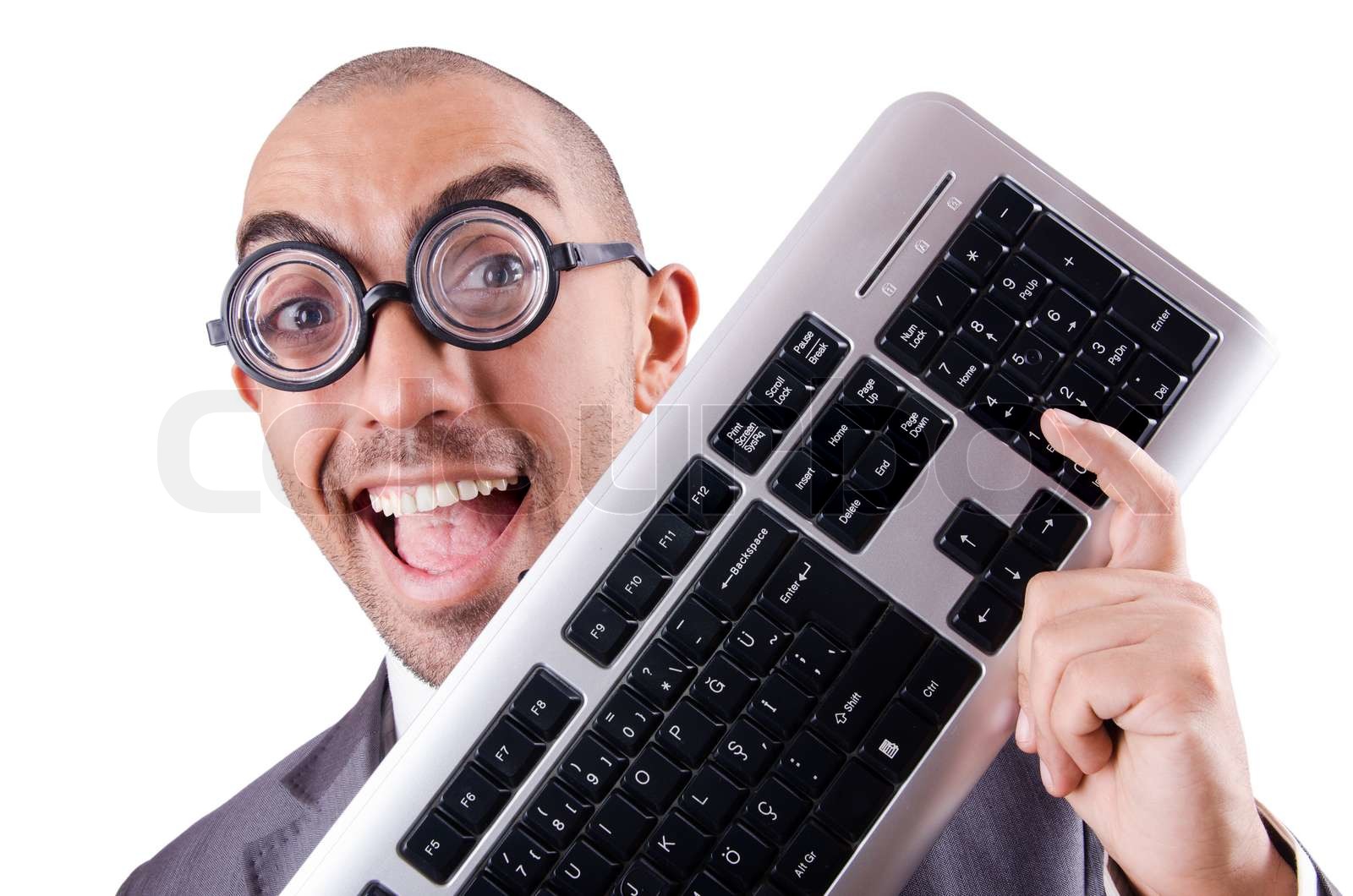 Nerd businessman with computer keyboard on white | Stock image | Colourbox